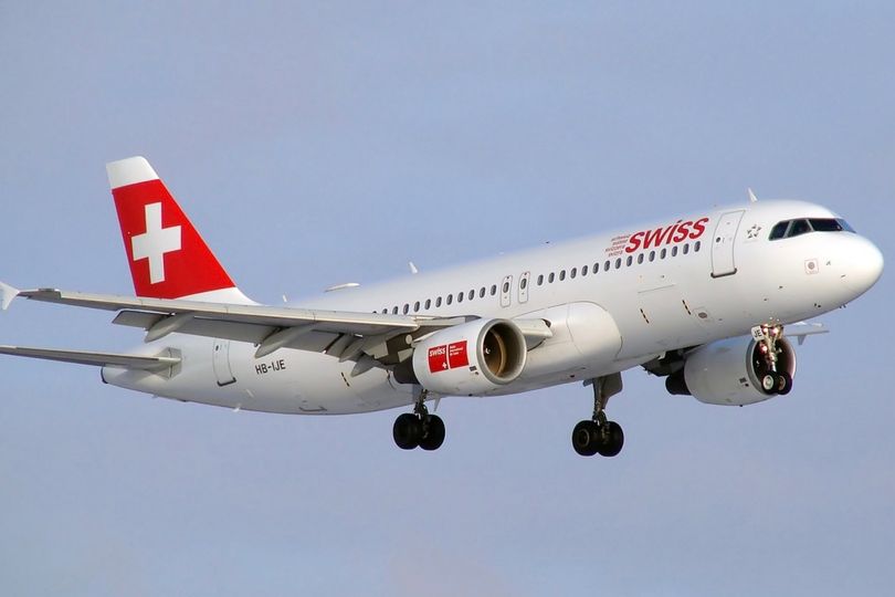 Flight from London forced to make emergency landing as fire crews swarm ...