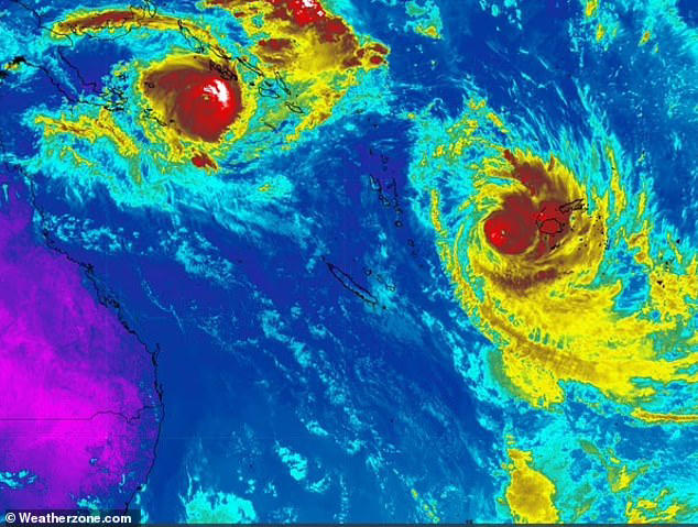 Urgent warning to travellers as two intense cyclones bear down on ...