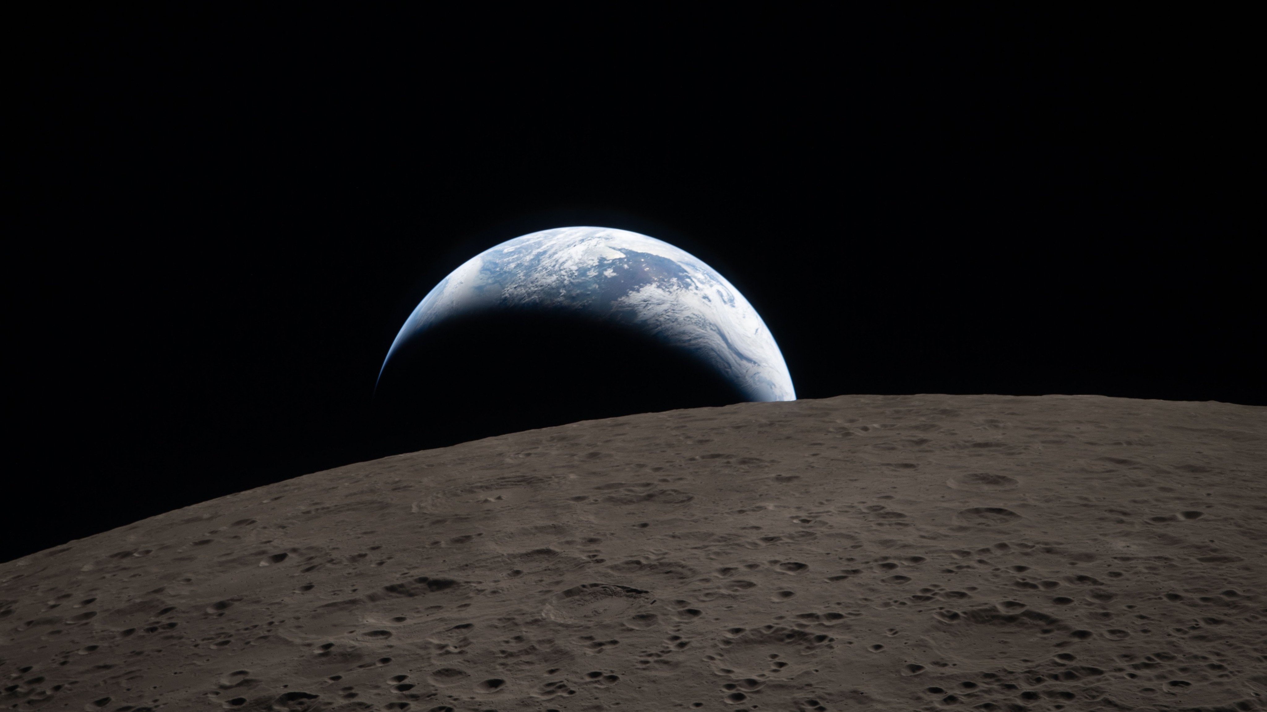 Artemis II commander shares a remarkable video of Earth vanishing ...