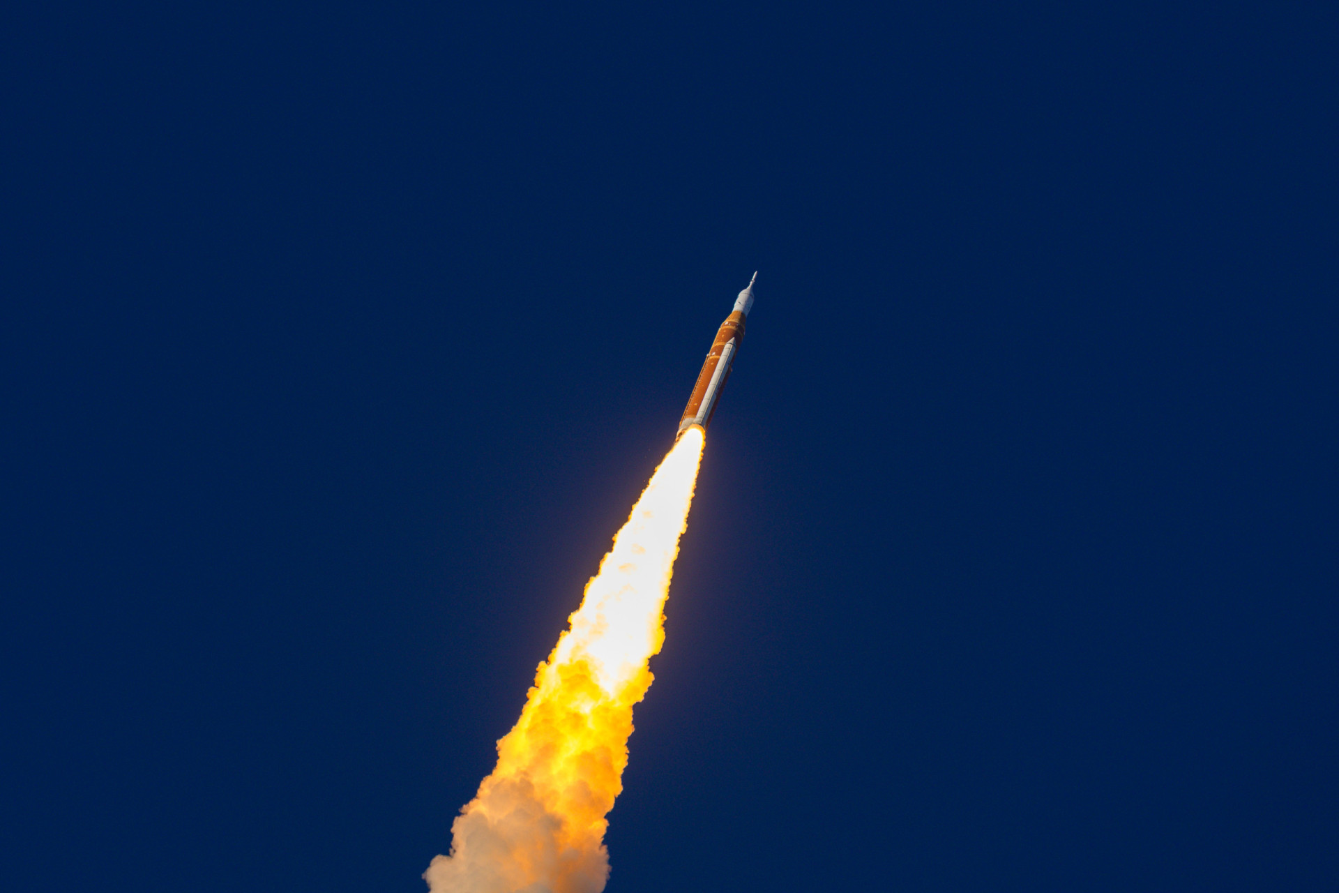 How exactly do you orbit the Earth, and what are the dangers of reentry?