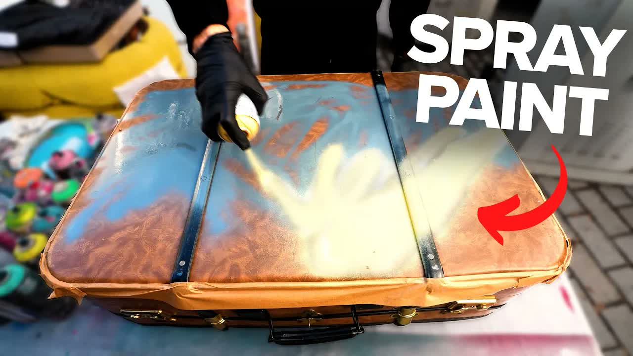 Custom spray art on a luxury briefcase
