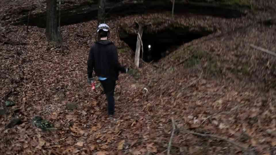 They found a blocked passage in the cave - then started digging anyway