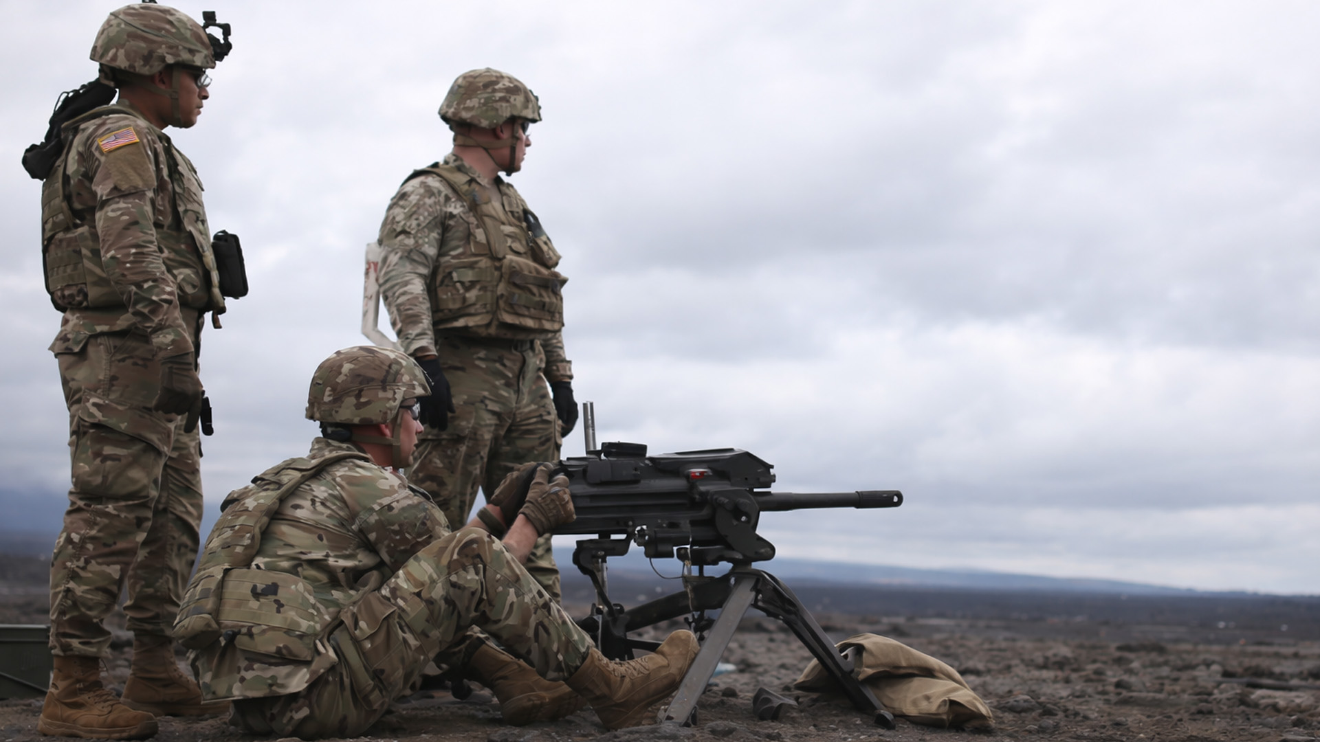 Soldiers train with machine guns and grenade launchers