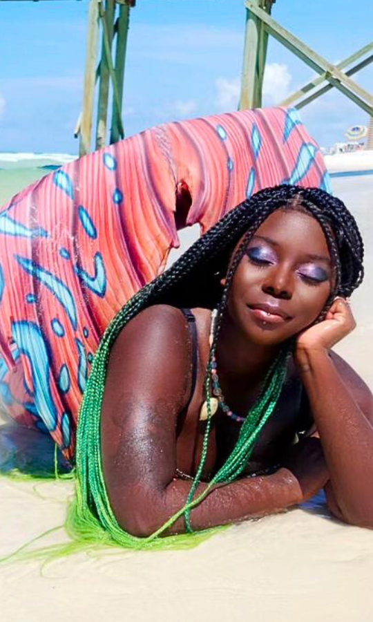 I've spent $25K becoming a mermaid