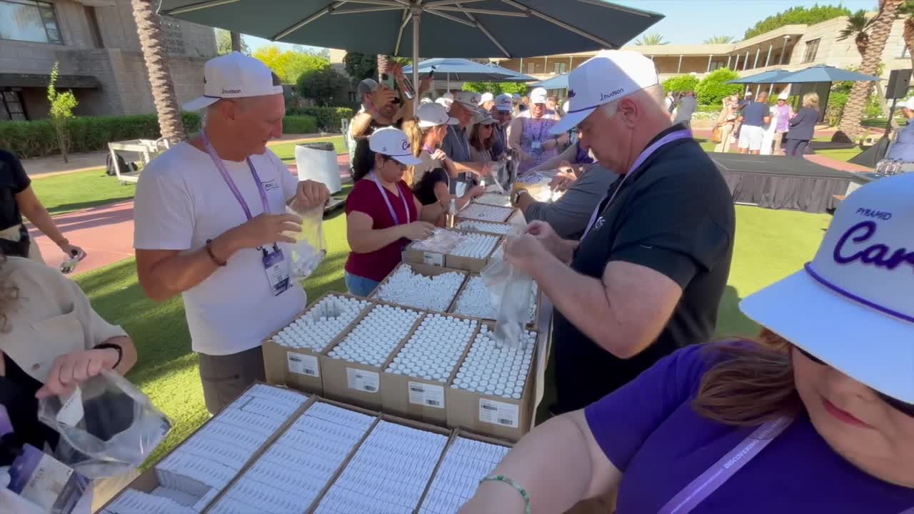 Volunteers come together to assemble care kits for families in need