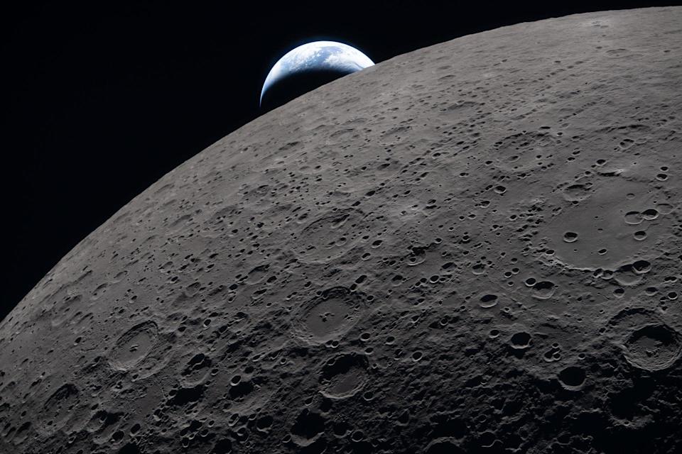 Artemis II crew basks in glow of lunar flyby en route to Earth