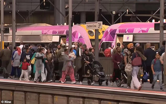 Aussies lose it as crowds swarm train stations after Albo issued plea ...