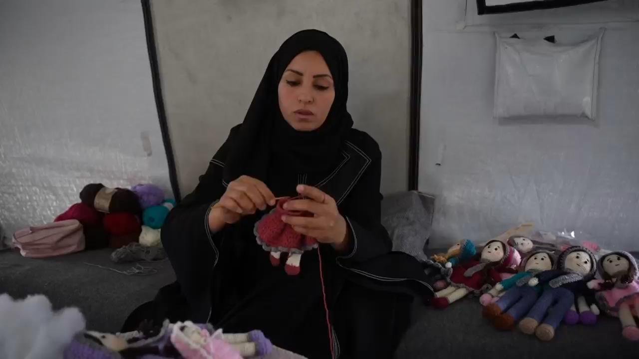 Gaza woman scrapes living making and selling dolls to bring some joy to ...