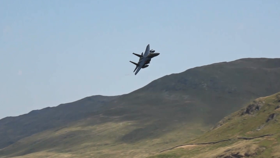 Watch this F-15E scream low through the valley - "That blue note was ...