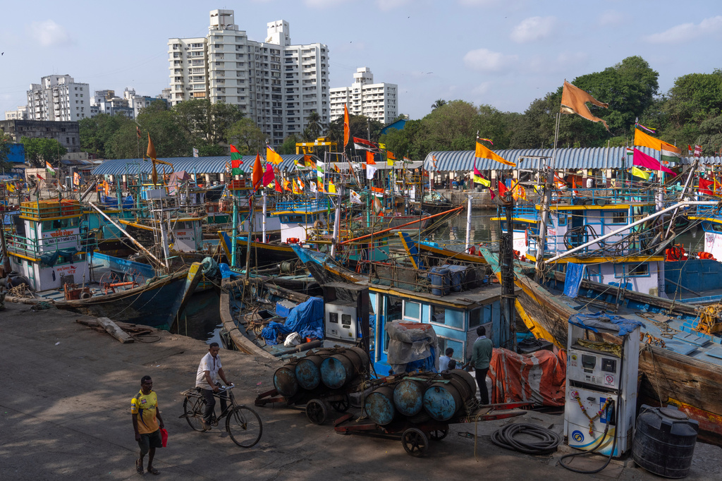 Photos show boats sitting idle at Mumbai’s historic dock as the Iran ...