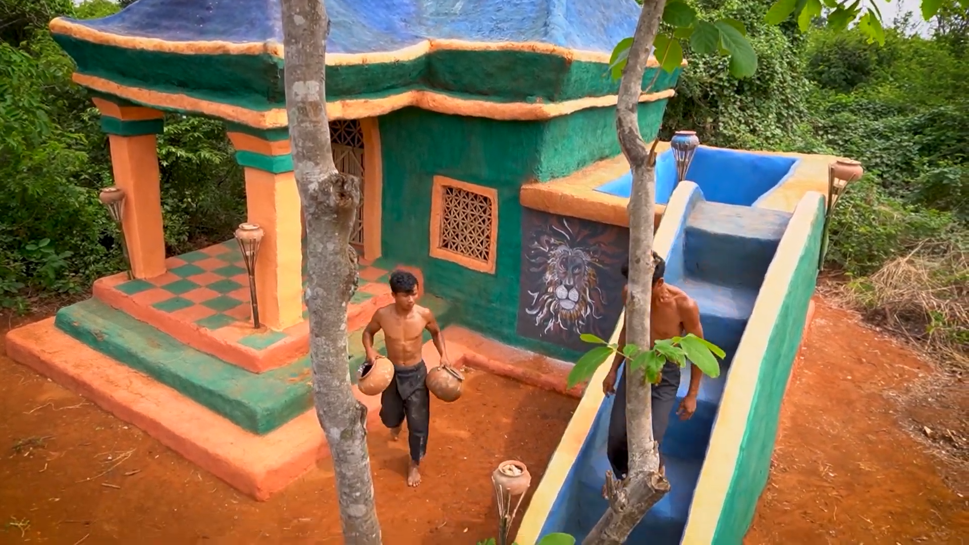 They built the colorful mud house by hand, and the rooftop pool nearly ...