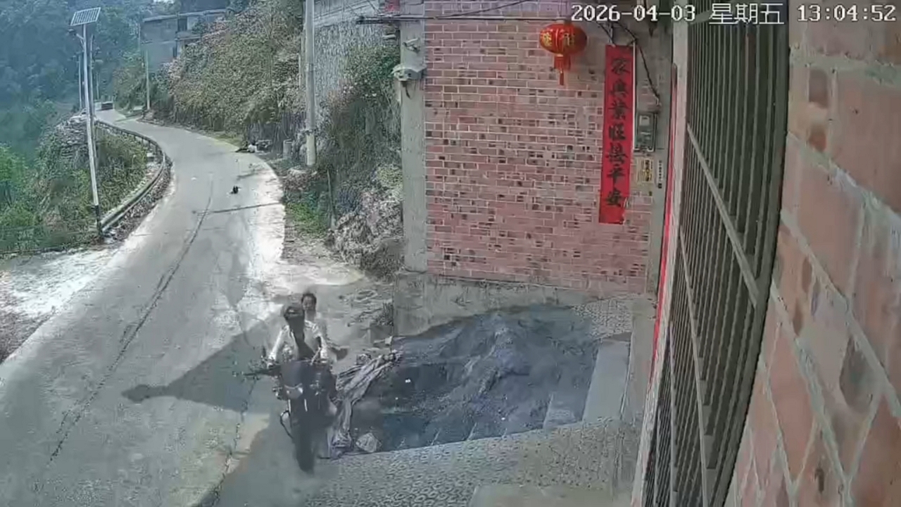 Motorcycle collision on curvy road in Guangxi, China