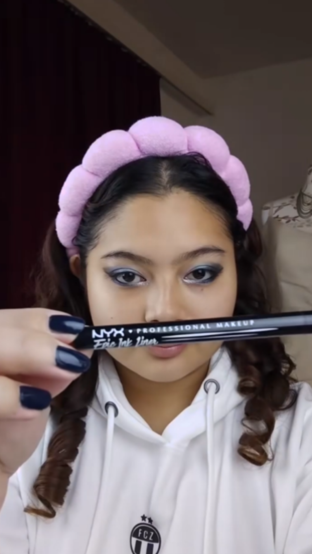 Blue and white igari makeup look with soft dewy glow