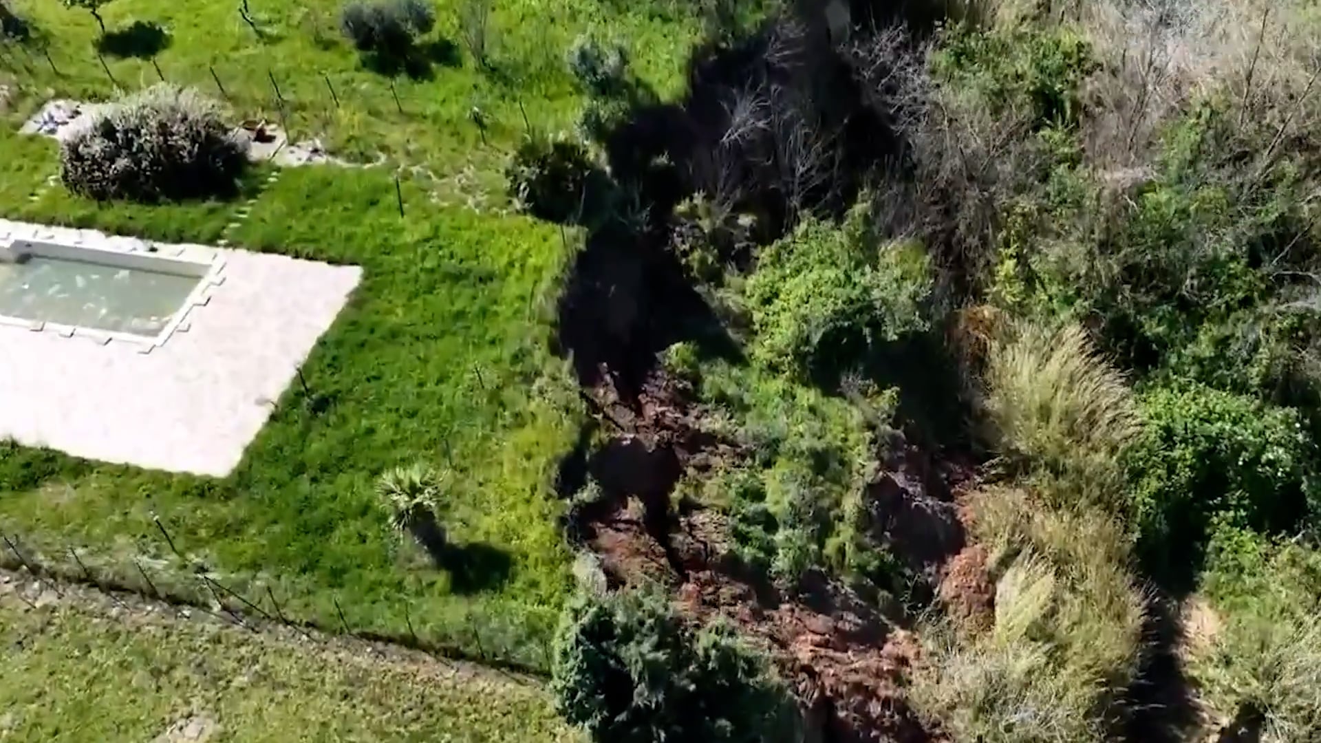 Aerial footage shows damage from landslide in Italy