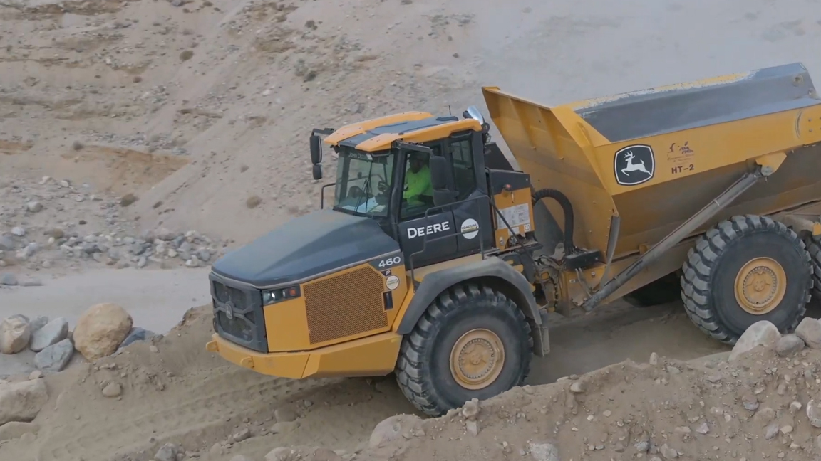 This heavy machine carries large loads with steady control