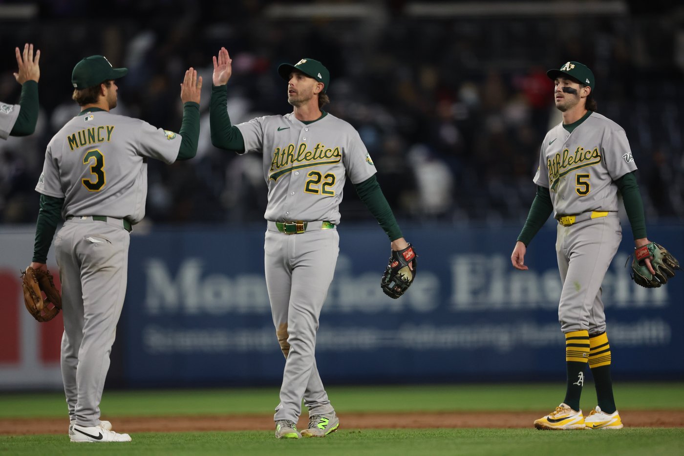 Rooker's 9th-inning sacrifice fly lifts Athletics over Yankees 3-2