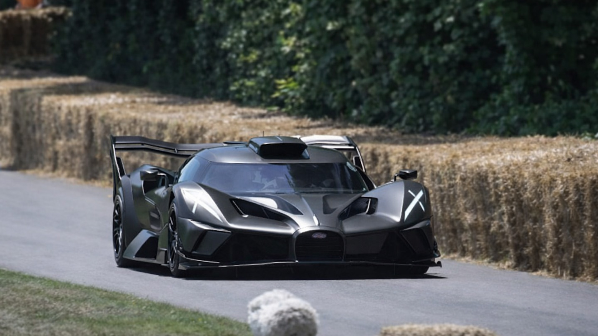 Watching the Bugatti Bolide pushed hard on the racetrack at high speed