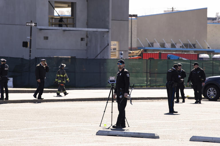 1 man is dead and 2 workers are missing after a parking garage ...