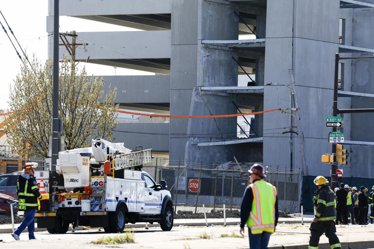 1 man is dead and 2 workers are missing after a parking garage ...