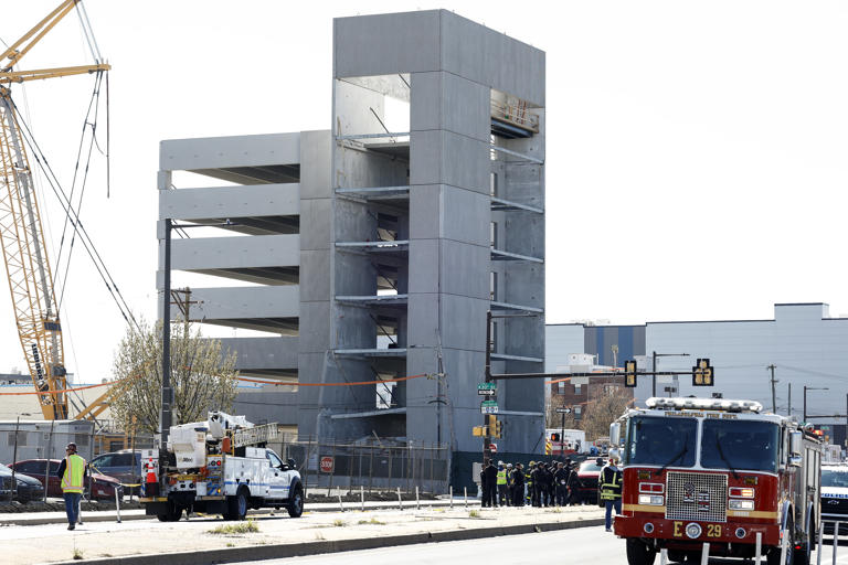 1 man is dead and 2 workers are missing after a parking garage ...