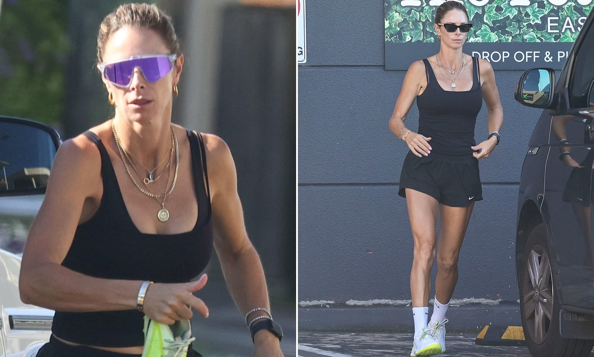 Candice Warner has a face like thunder as she runs errands following ...