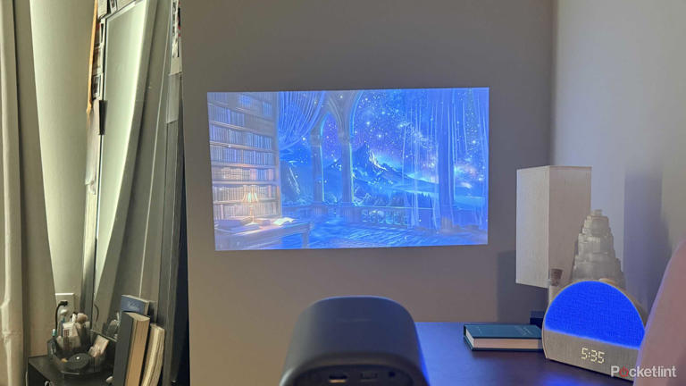 I tried choosing between a projector and a TV - here's why I kept both