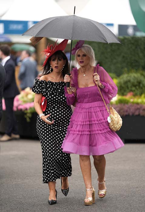 PICS: Polka dots and pink shine bright as Aintree Races gets off to a ...