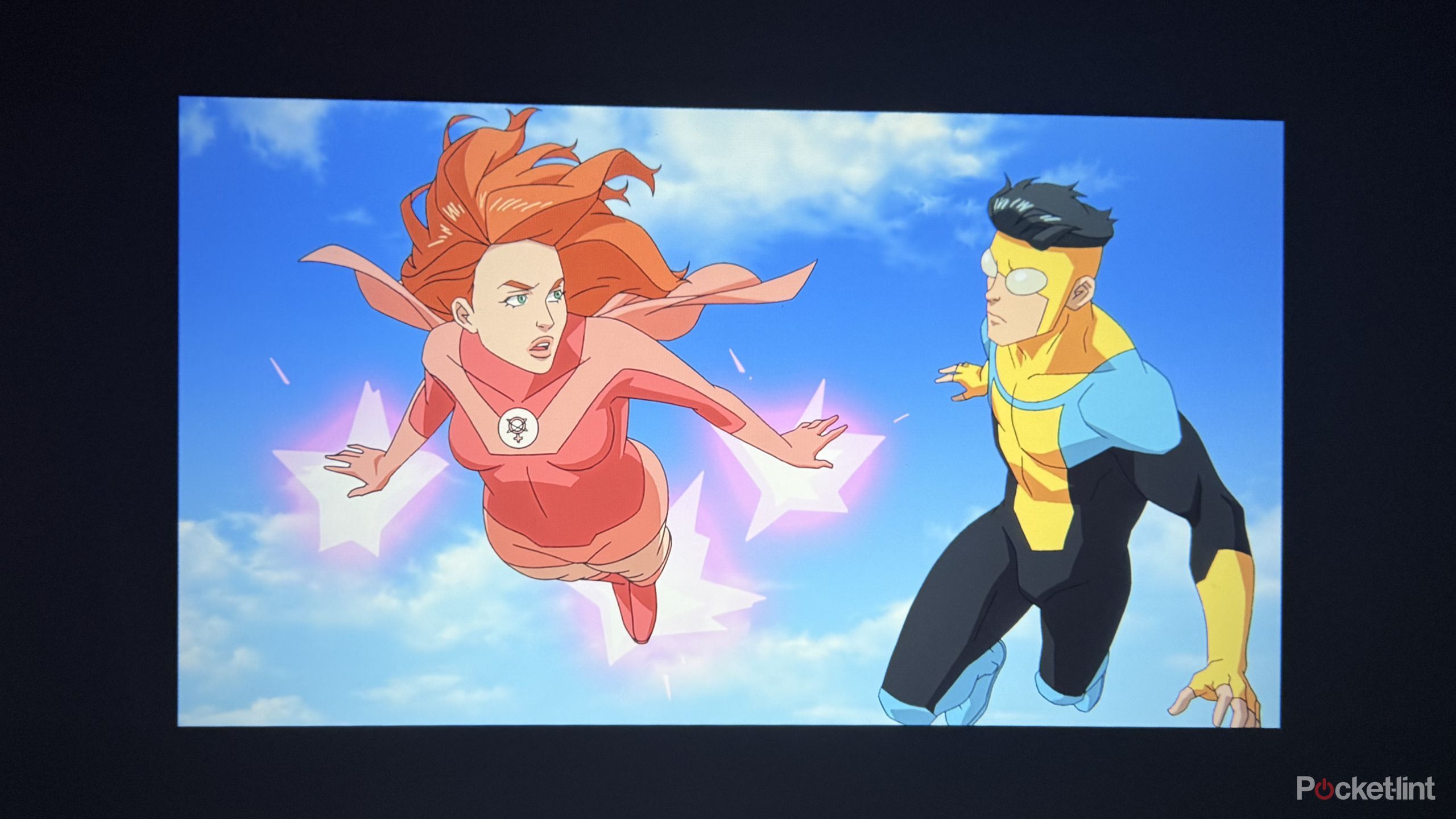 I tried choosing between a projector and a TV - here's why I kept both
