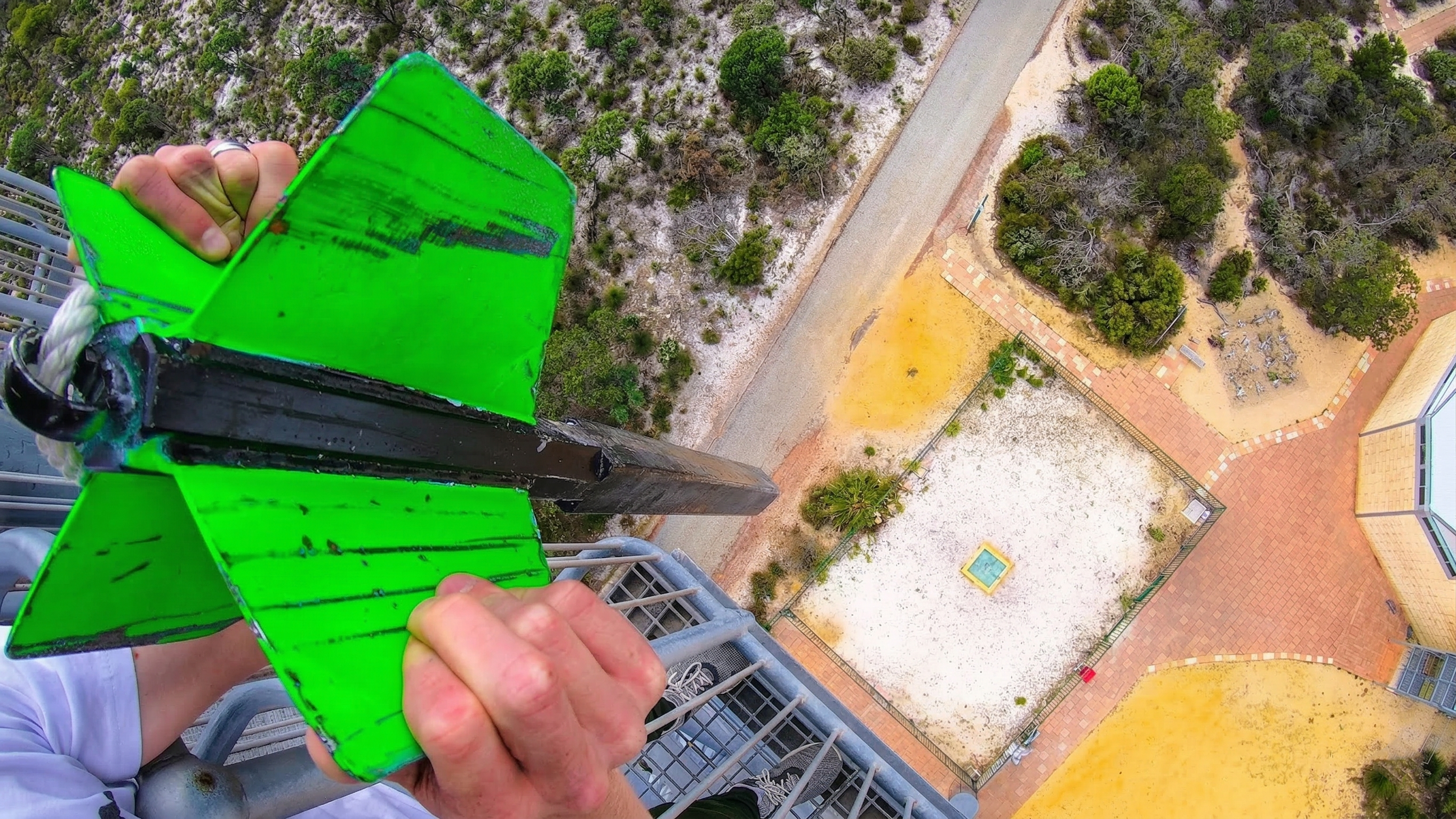 Watch what happens when a giant dart is dropped on bulletproof glass ...