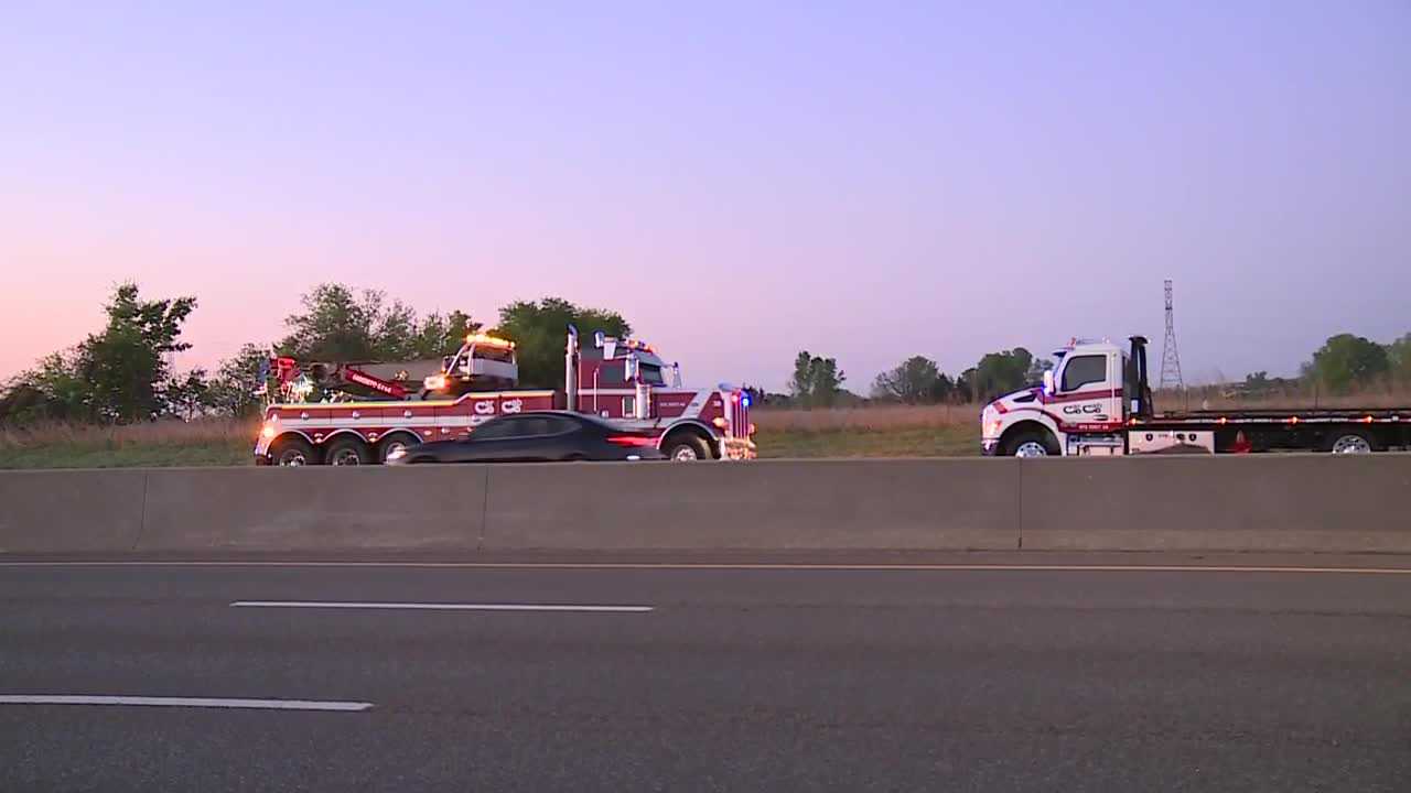 Crash involving overturned semi-trailer cleared after causing traffic ...