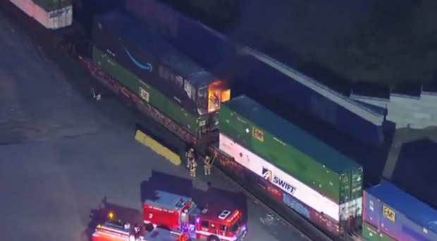 Amazon cargo container catches fire on moving train in downtown Los Angeles