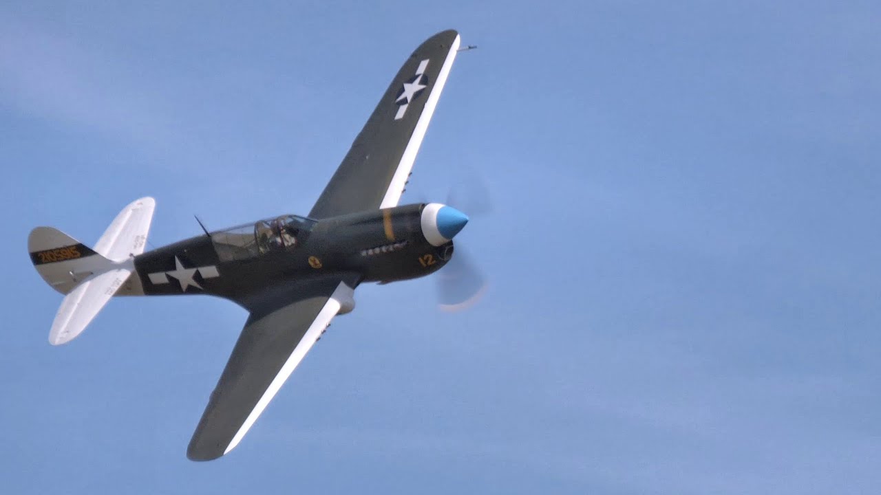 Watch this WWII fighter roar past the crowd - "That nose art says ...