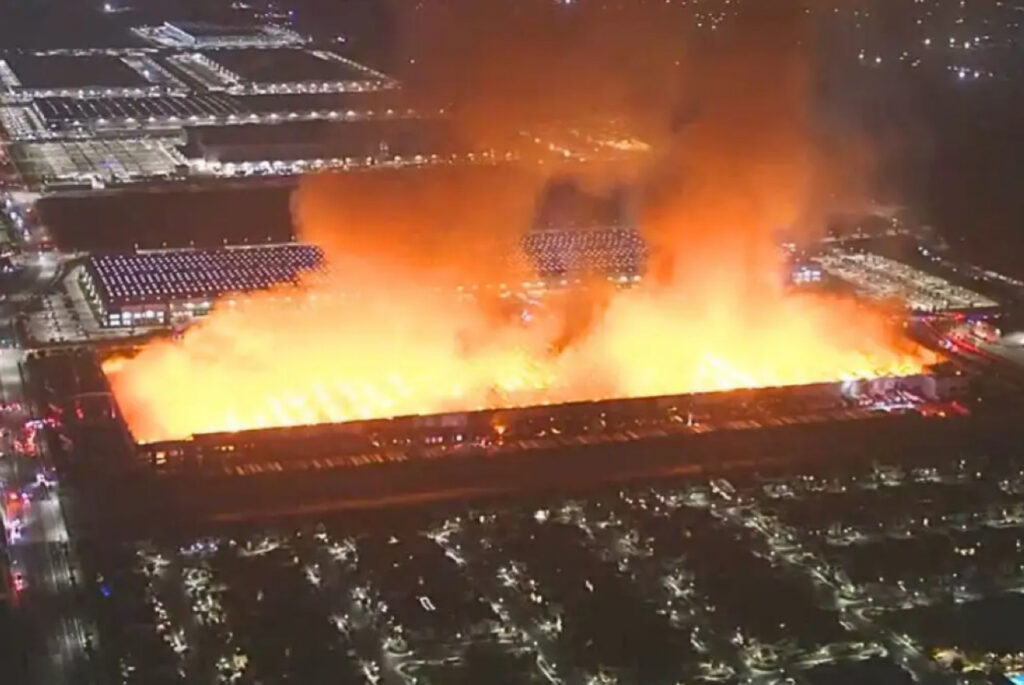 Massive warehouse fire breaks out after employee shares footage of ...