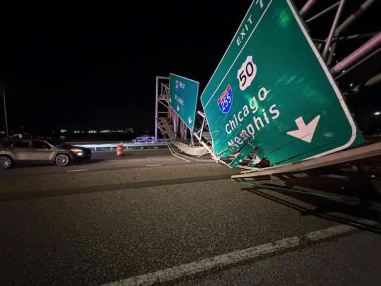 Dump truck hits sign, shuts down I-64 for hours
