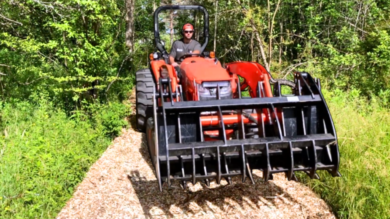 Kubota tractor grapple land clearing made easy