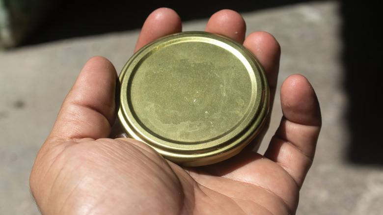 How to easily turn old jar lids into adorable countertop decor