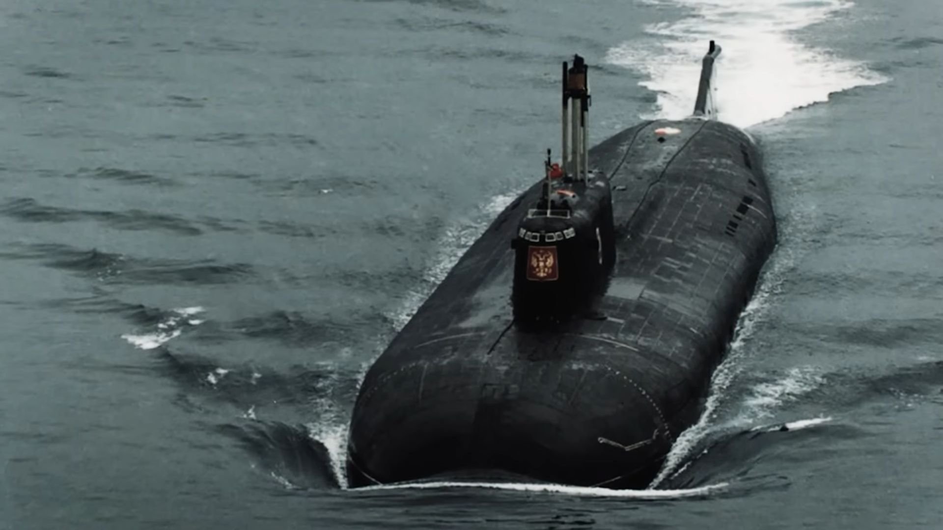 Watch a 9,000 ton nuclear sub rise from the ocean floor
