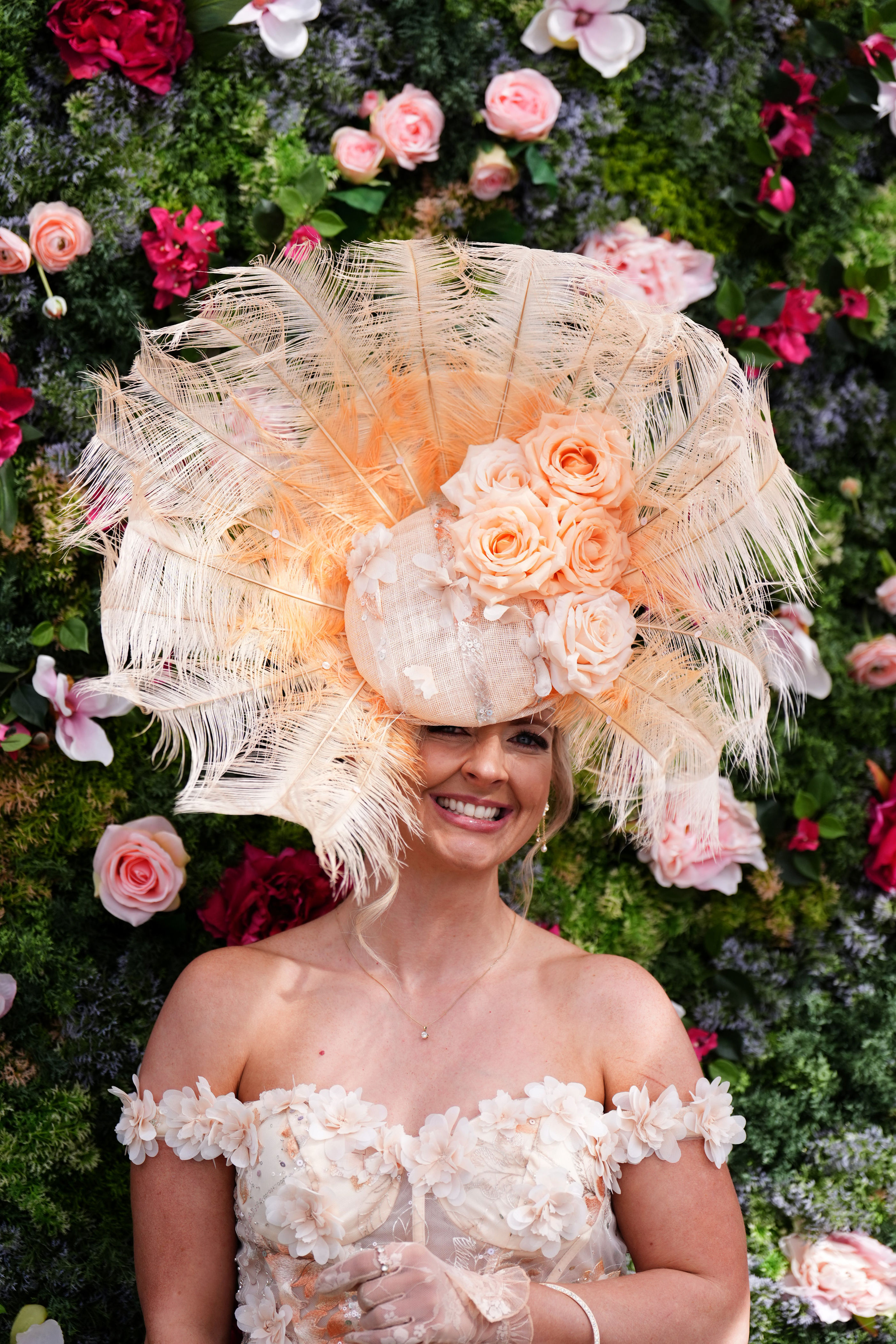 Zara Tindall among punters in stylish hats for Ladies Day at Aintree