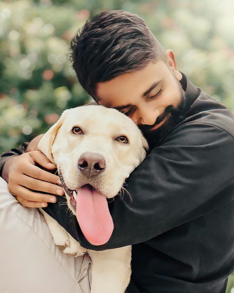If your dog sleeps glued to you, it might be one of these 13 breeds