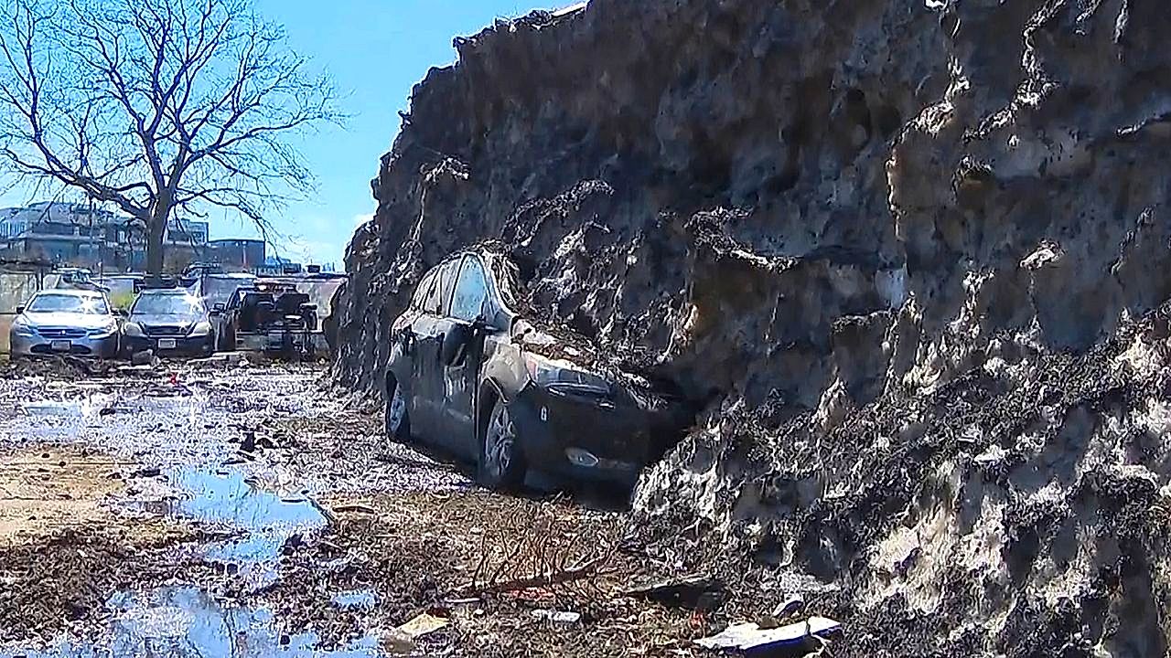 Six cars buried under giant snow pile by city council in Massachusetts