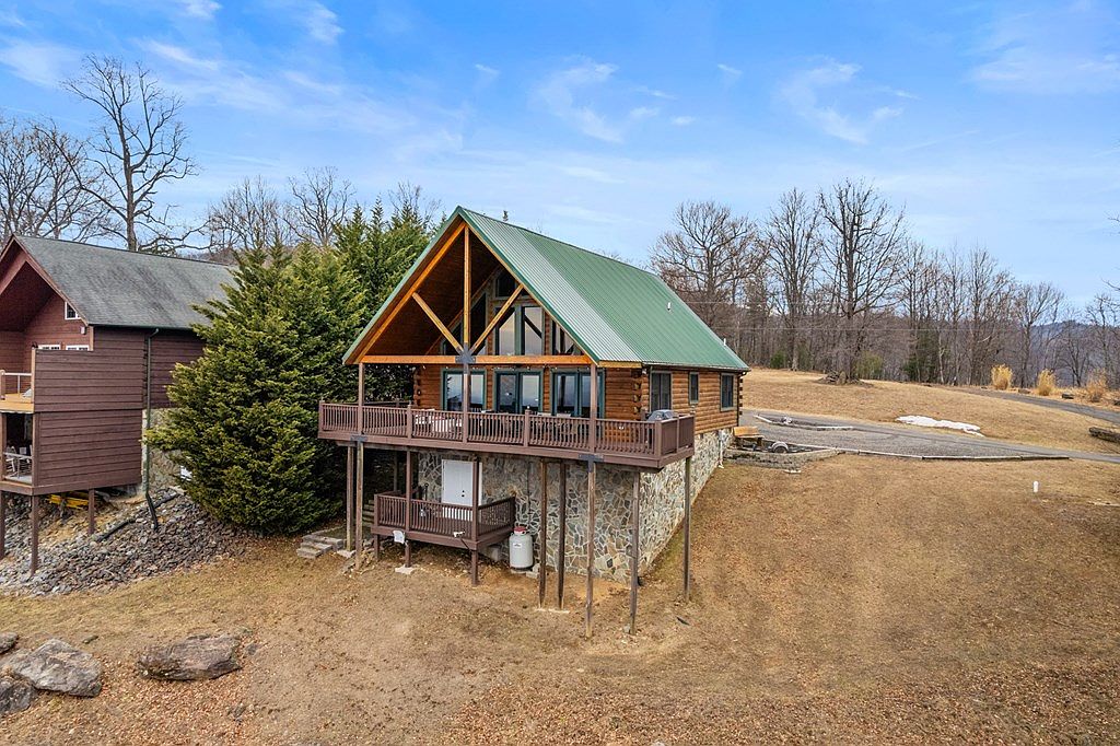 Experience tranquil mountain living in a 2008 rustic retreat in Fancy ...