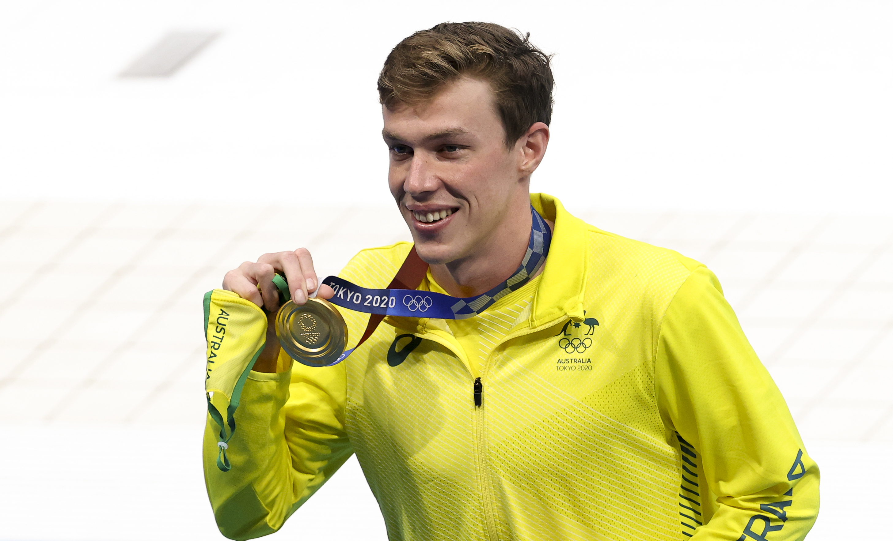 Swimming drama as golden couple quit top coach's squad