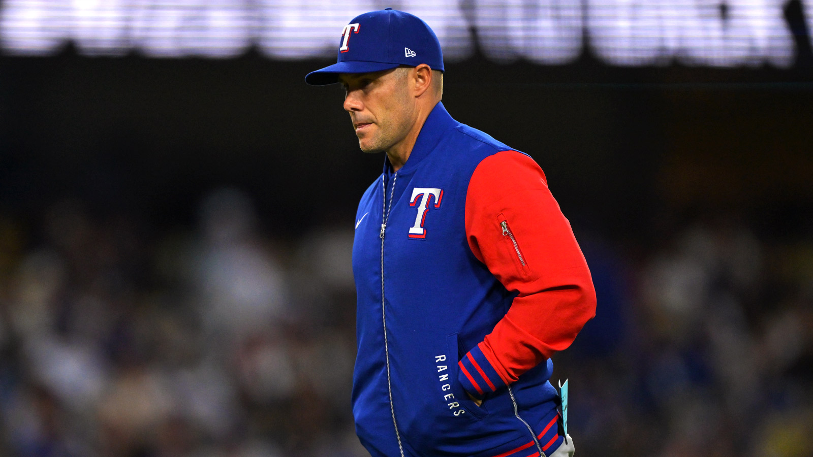 Rangers re-sign reliever to minor league contract