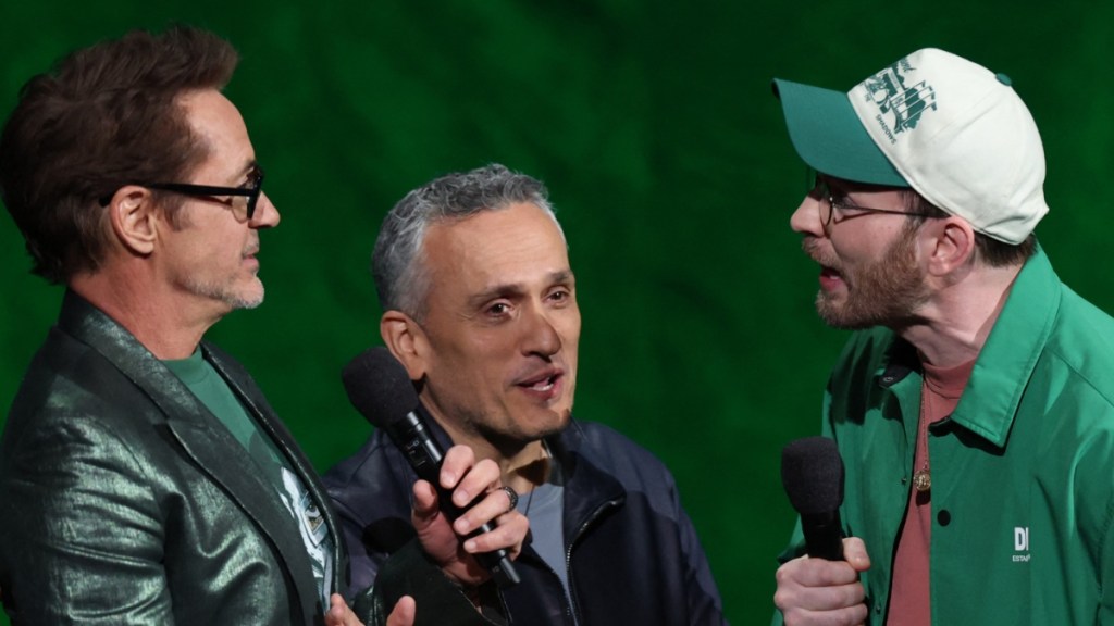 Robert Downey Jr. makes a Tony Stark entrance, faces off with Chris Evans