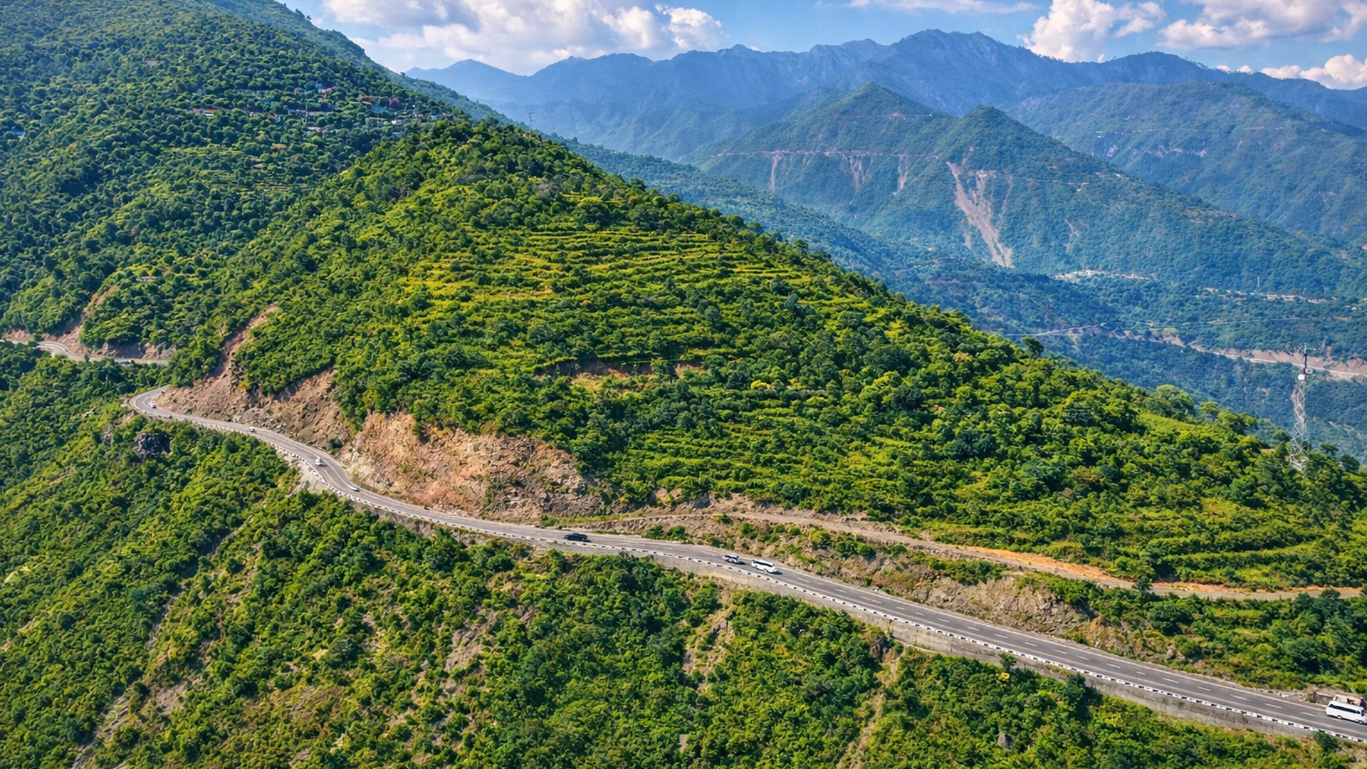 Winding mountain roads climbing through the Himalayas