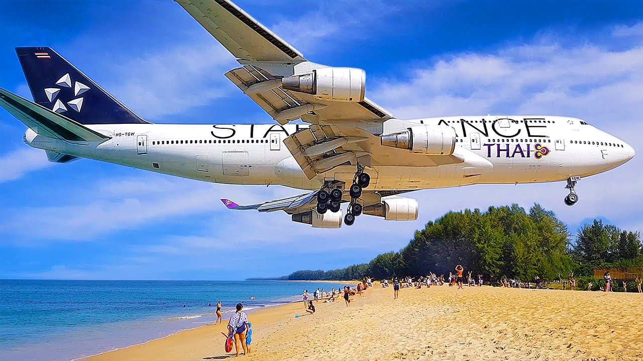How 800,000 pound jets land just feet above a beach full of people