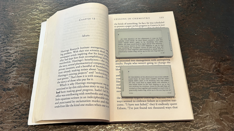 I'm reading a 900-page novel on an e-reader the size of my library card ...