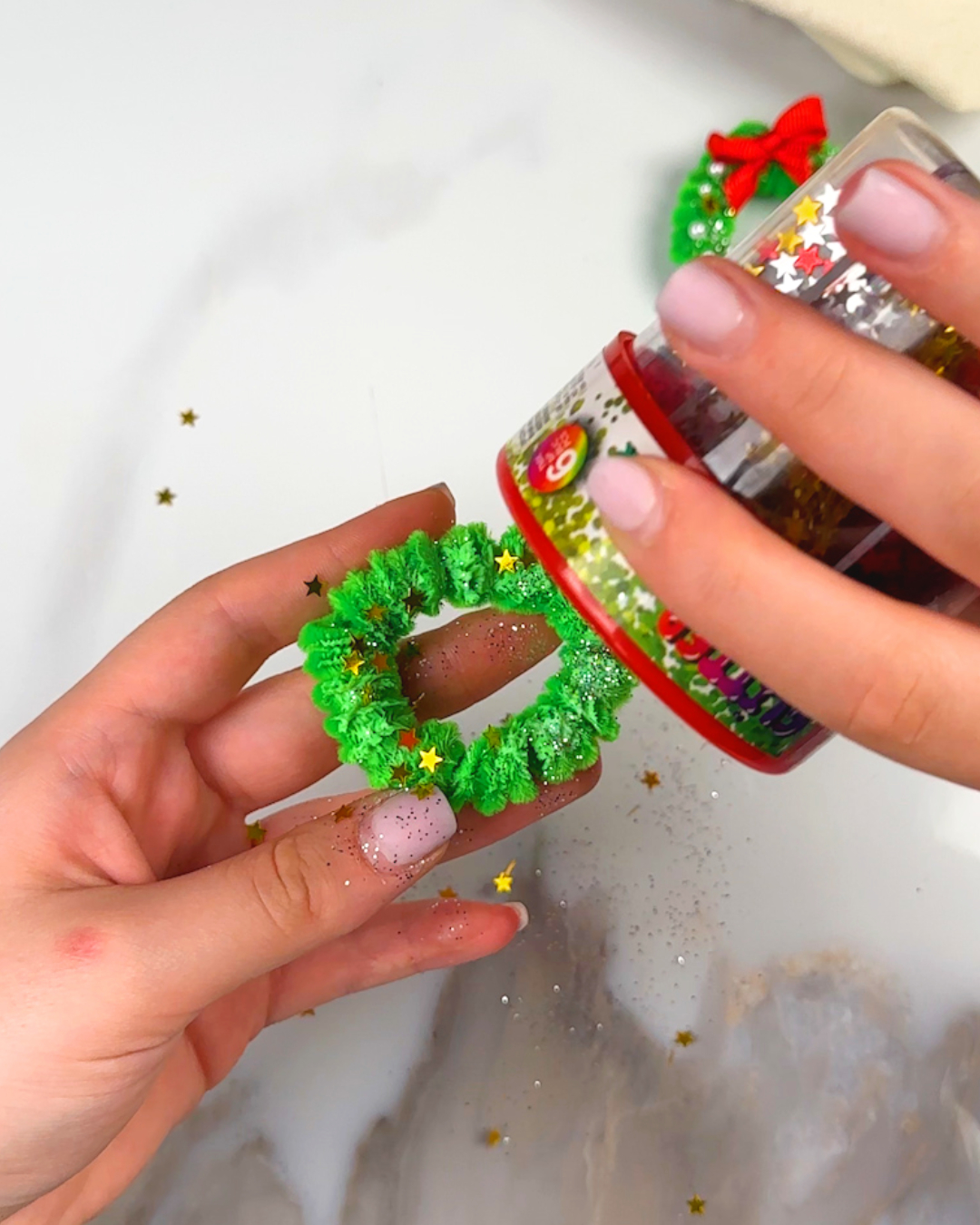 Crafting adorable mini Christmas wreaths 🎄