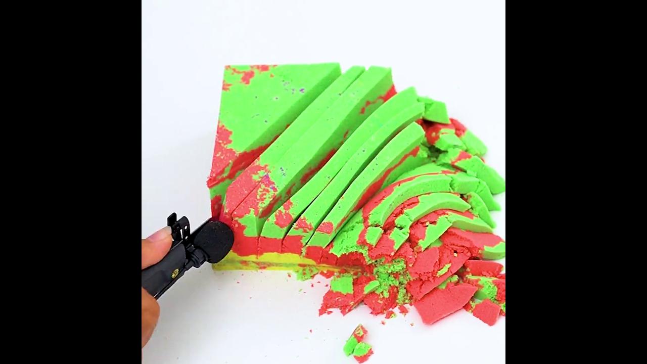 Satisfying cutting neon green and coral foam block with serrated knife ...