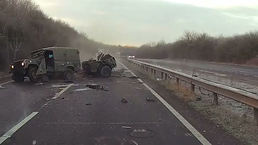 Driver flung from army truck after car swerves in front of convoy